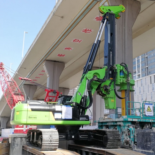 Low headroom drilling rig